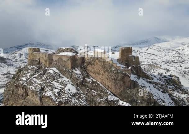 Drone view of goat castle built on top of cliffs, ancient medieval ...