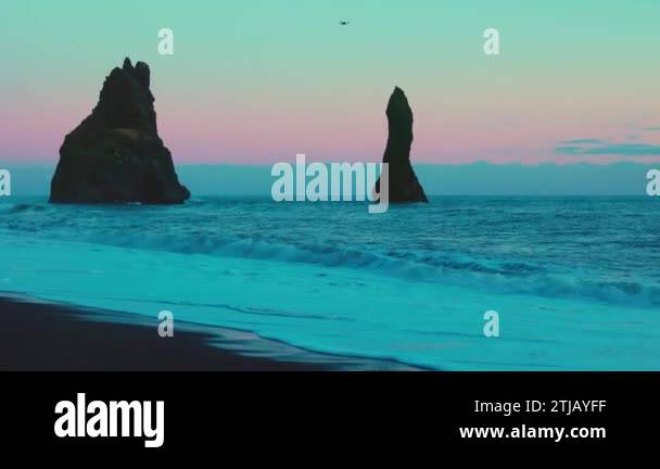 Atlantic shore with majestic rocks on reynisfjara beach and reynisfjall ...