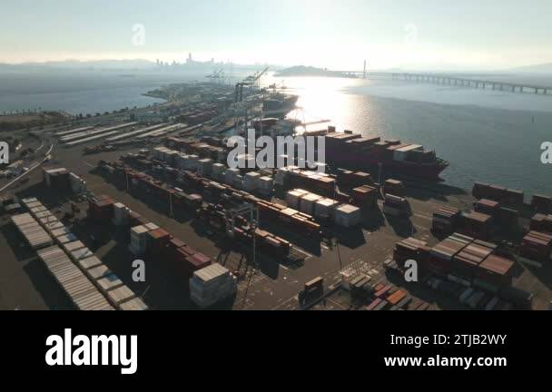 Logistics and transportation of Container Cargo ship with working crane ...