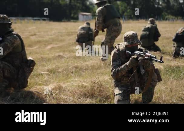 The Military Special Forces Unit attacks the enemy with ammunition and ...