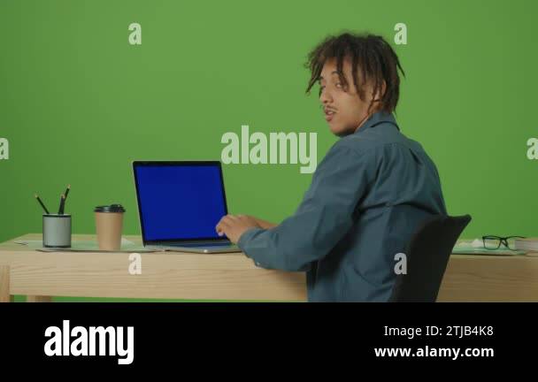 Young Multicultural Freelancer Student Typing on Blue Screen Laptop ...