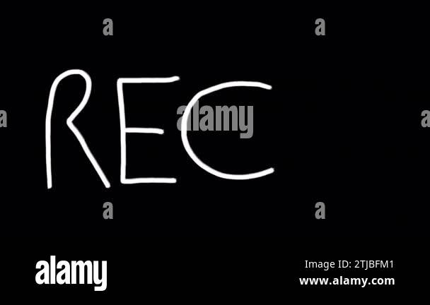 A Rec button with a blinking red circle on a black screen. Video ...