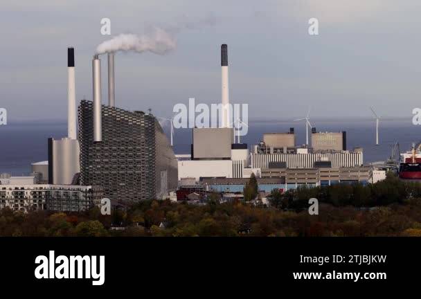 Copenhagen, Denmark The CopenHill power plant and wind turbines in the ...