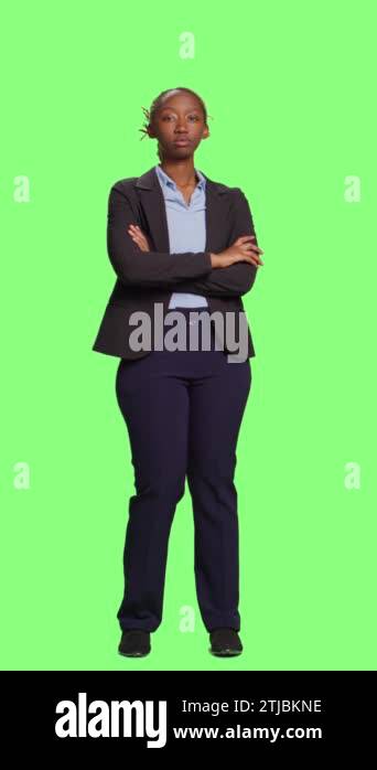 Vertical video: Full body greenscreen backdrop of office manager ...