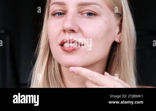 Second chin, obesity. Portrait of a 30-year-old woman pulling back the ...