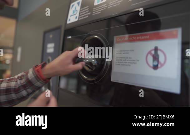 Male returns plastic bottles, reusable containers to reverse vending ...