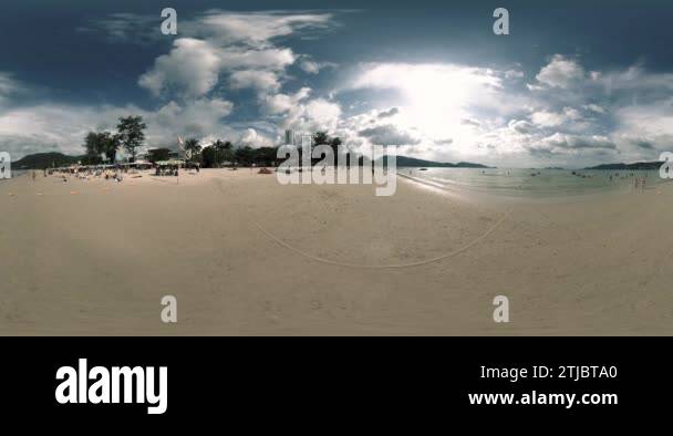 360 VR beautiful beach sea sand and sky. The big sun in the clouds ...
