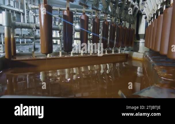 Freezing ice cream at the factory. Automatic production of ice cream ...