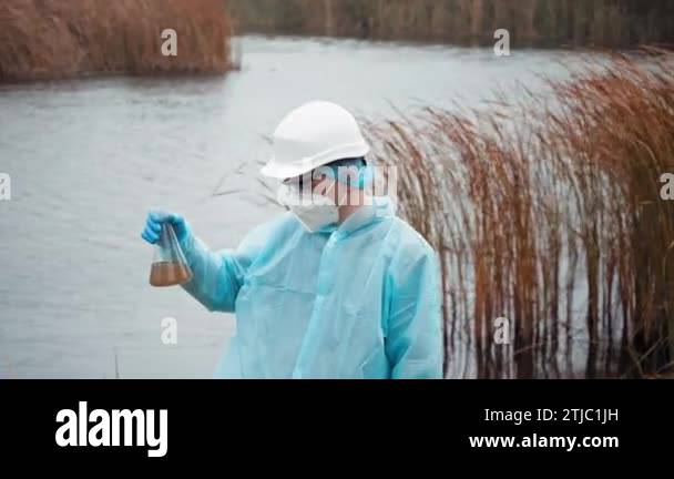 Conserve Water And Environment, Cientist Wearing Protective Uniform And ...