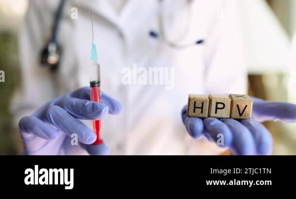 HPV virus vaccine with syringe in doctor hands. Papillomavirus ...