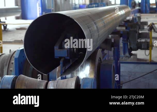 Pipe manufacturing plant. Pipe plant. Iron pipe welding. Pipe expansion ...