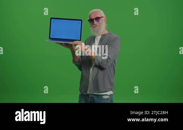 Green Screen.Portrait of an Old Man in the Funny Glasses with a Laptop ...