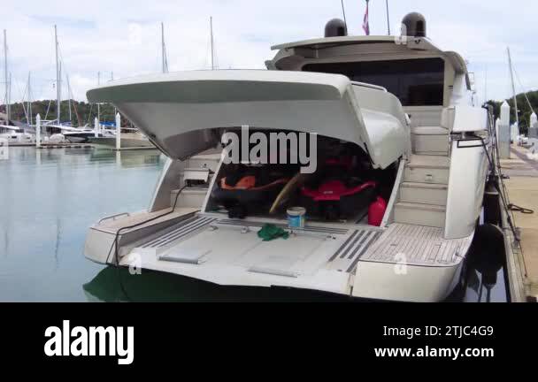Jet skis in the trunk of a luxury motor yacht, jet skis on board an ...