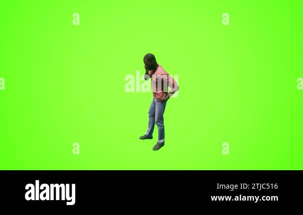 African American men talking on mobile phones and walking beating and ...