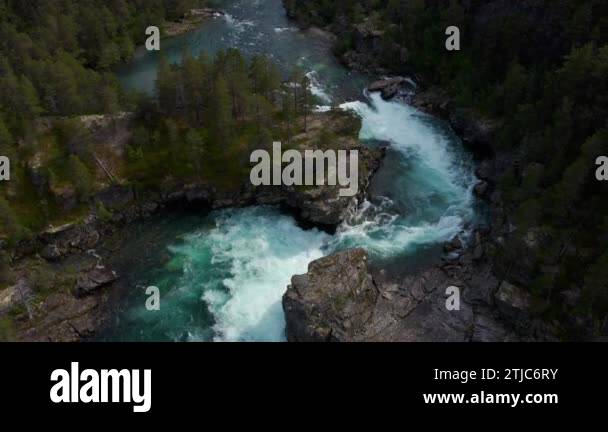 Aerial topdown view of powerful ocean current forming whirlpools and ...