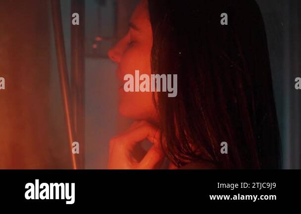 Beautiful sportive woman body in bath room, touch hand herself with ...