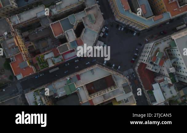 Top down panning footage of blocks of apartment buildings and streets ...