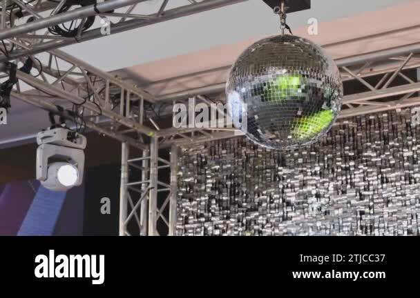 Laser Beam Reflector and Rotating Mirror Ball in Retro Style Disco Club ...