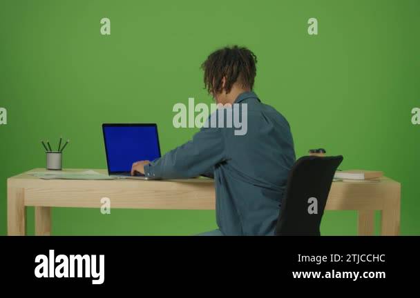 Young Multicultural Freelancer Student Typing on Blue Screen Laptop ...