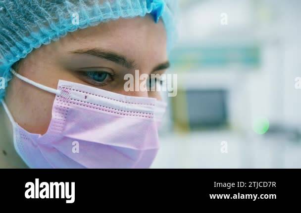 the face of a sad surgeon in a sterile mask who could not save the ...
