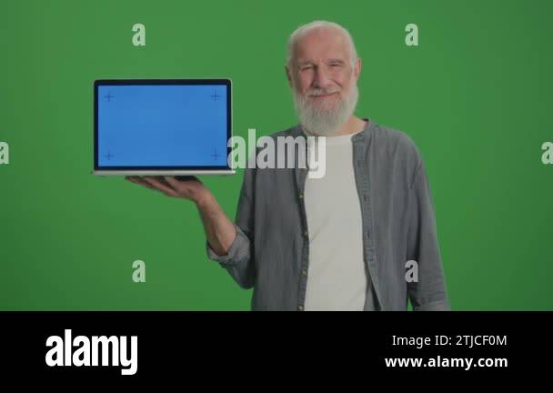 Green Screen.Portrait of an Old Man with a Laptop with Blue Screen ...