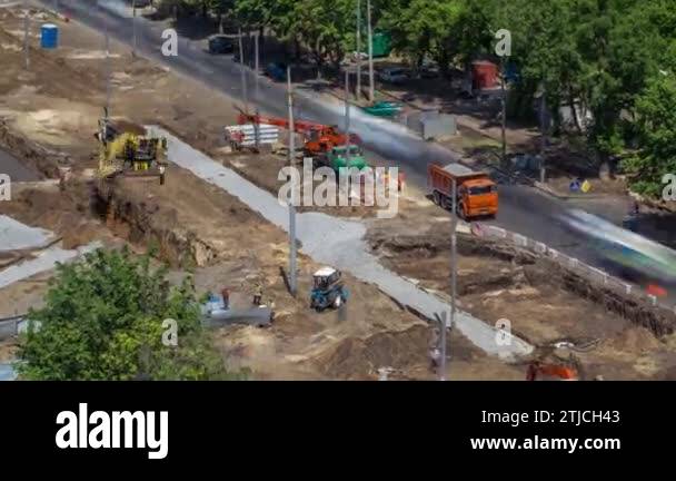 Industrial truck loader excavator and bulldozer moving earth and ...