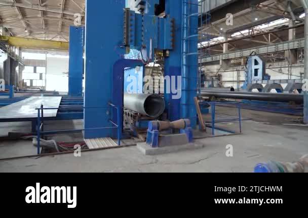 Pipe manufacturing plant. Pipe plant. Iron pipe welding. Pipe expansion ...
