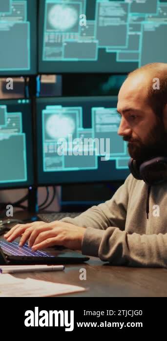 Vertical video: Cyber scammer hacking server to destroy information ...