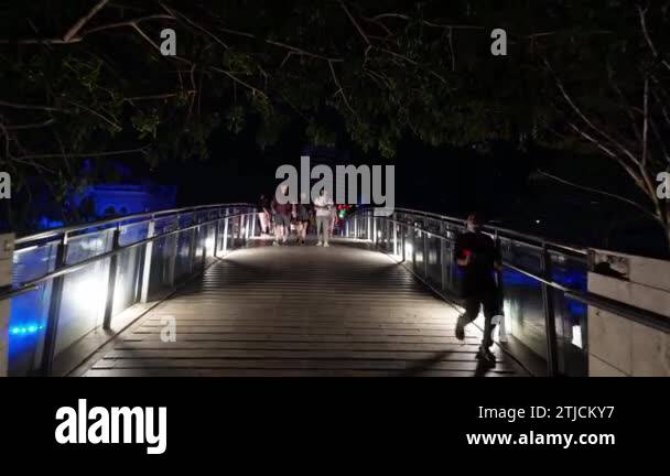 City Center, Kuala Lumpur, Malaysia - Sep 11 2022: Slow move over pedestrian bridge of Masjid ...