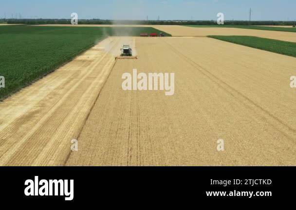 Above view dolly move overfly forwards agricultural harvester, combine ...