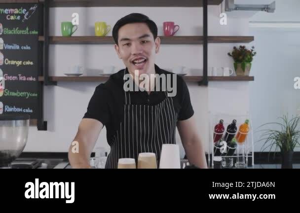 Coffee shop concept of 4k Resolution. The barista is introducing the ...