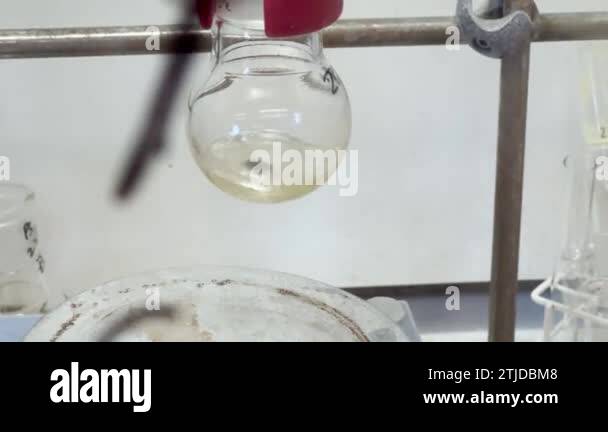 Colourful reactions under heating condition in sand bath. 4K video ...