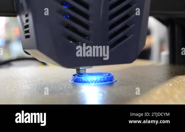 3D printer. 3D printer printing process close-up. 3D printer creating ...