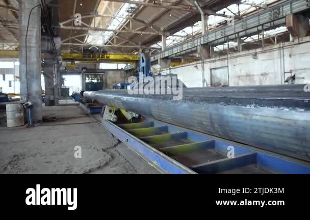 Pipe manufacturing plant. Pipe plant. Iron pipe welding. Pipe expansion ...