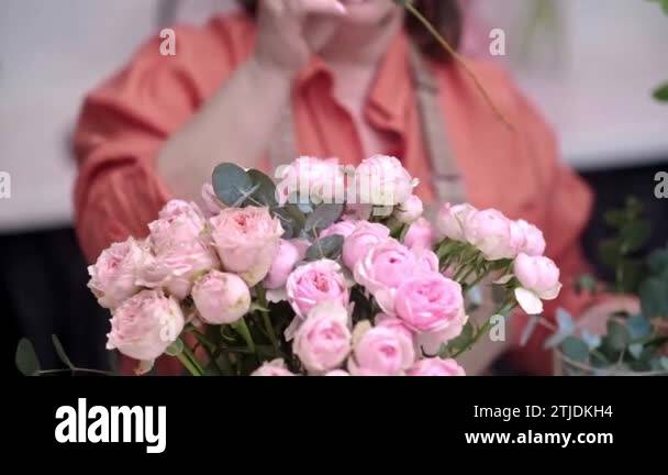 love for flowers, the successful female business owner of the flower ...
