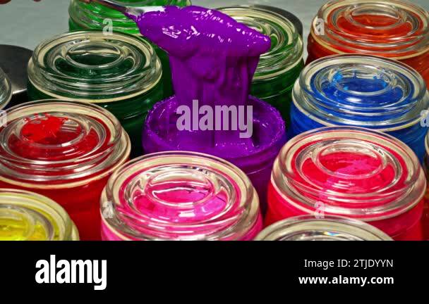 stirring purple color.Use a trowel to stir the mass in a clear glass ...