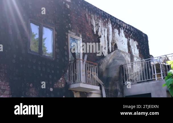 Burnt bombed house in sunrays outdoors in Kiev suburb Ukraine ...