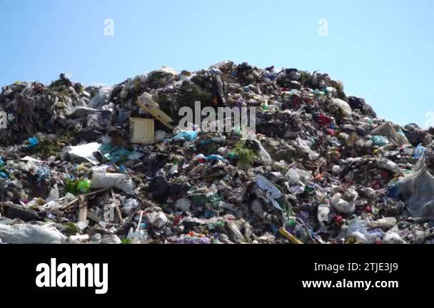 Pile of domestic garbage in landfill. City landfill. Land pollution ...