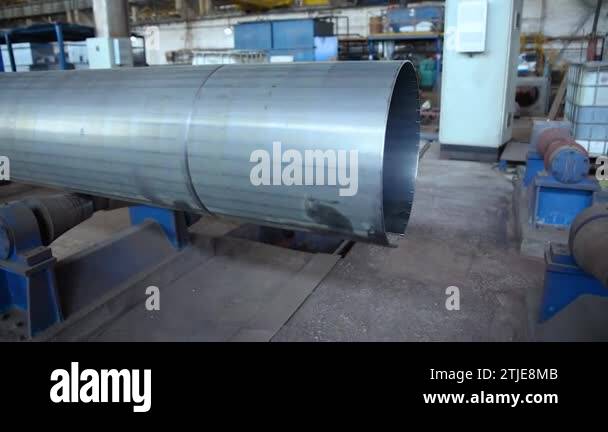 Pipe manufacturing plant. Pipe plant. Iron pipe welding. Pipe expansion ...