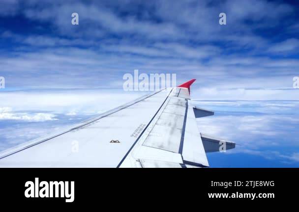 airplane window View of Beautiful Cloud sky with plane wings for travel ...