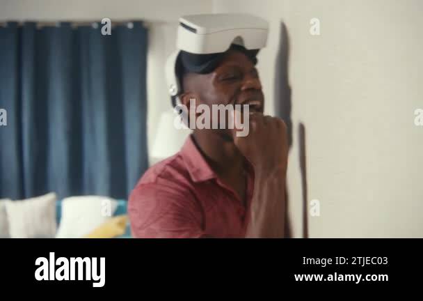 Angry multi ethnic men in VR headsets hit the wall with hands, scream ...