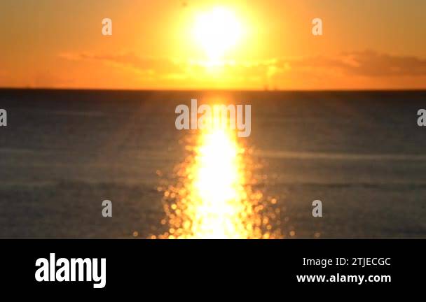 Blurred background. The sun shining in the sky during sunset dawn ...