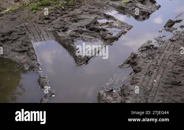 Rain puddle soil Stock Videos & Footage - HD and 4K Video Clips - Alamy