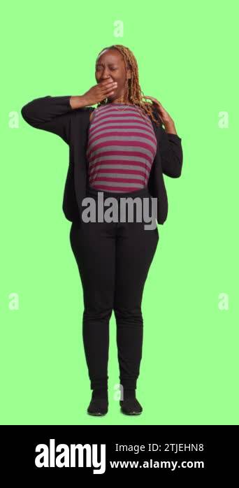 Vertical video: Full body of african american person yawning and being ...