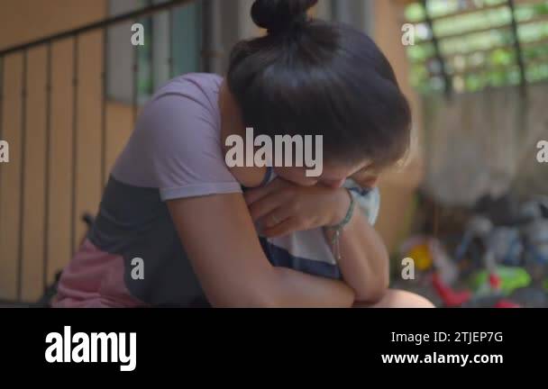 Child hugging mother consoling. Sad mom being comforted by son. Little ...