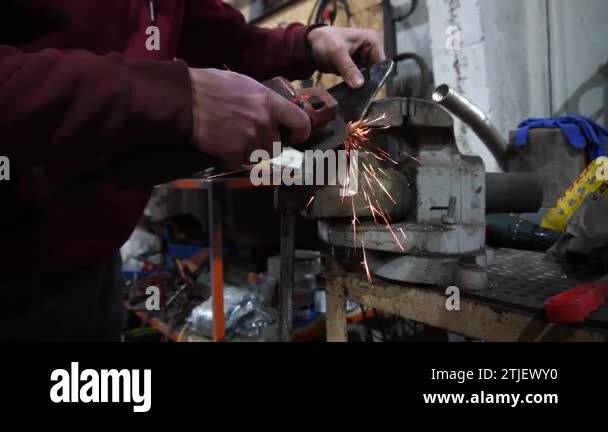 cutting metal and making custom parts for installing a car engine Stock ...