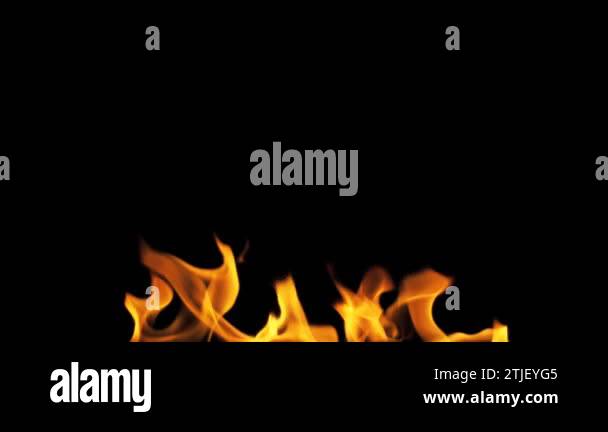 Igniting Fire Isolated on Black Background Stock Video Footage - Alamy