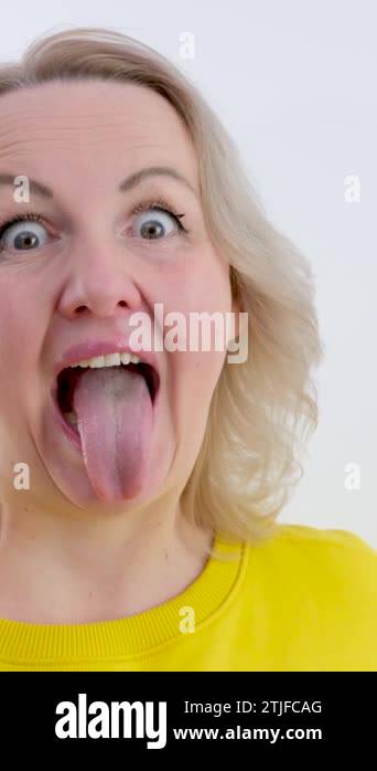 woman stuck out tongue opened eyes wide laughing teasing someone ...