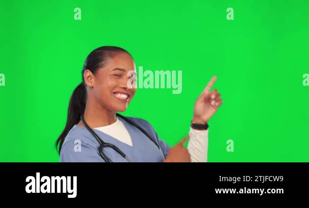 Woman, doctor and funny dancing by green screen with moving, face or pointing with mock up space ...
