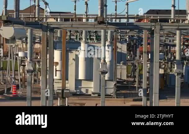 High voltage substation with pylons and distribution cables ...